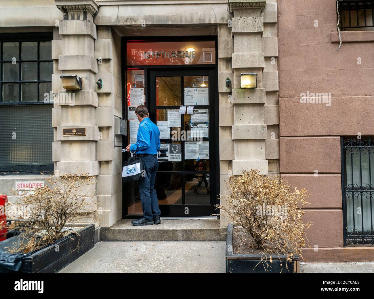 A Census worker at an apartment building in Greenwich Village in New ...