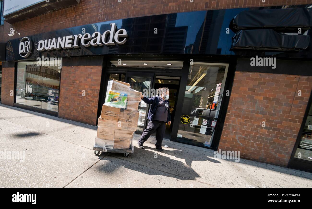 Worker makes a delivery to a store in the Duane Reade drug store chain ...