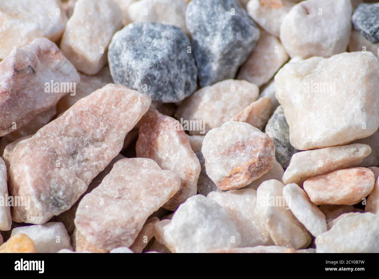 Raw rocks and minerals as natural stones background with crushed and ...