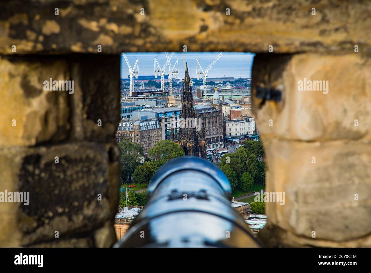 Stone and cannon opening guarding castle walls Stock Photo - Alamy