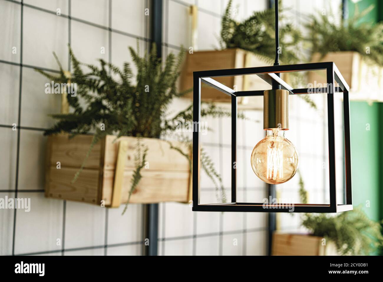 Creative loft style lamp with shining lightbulb Stock Photo - Alamy