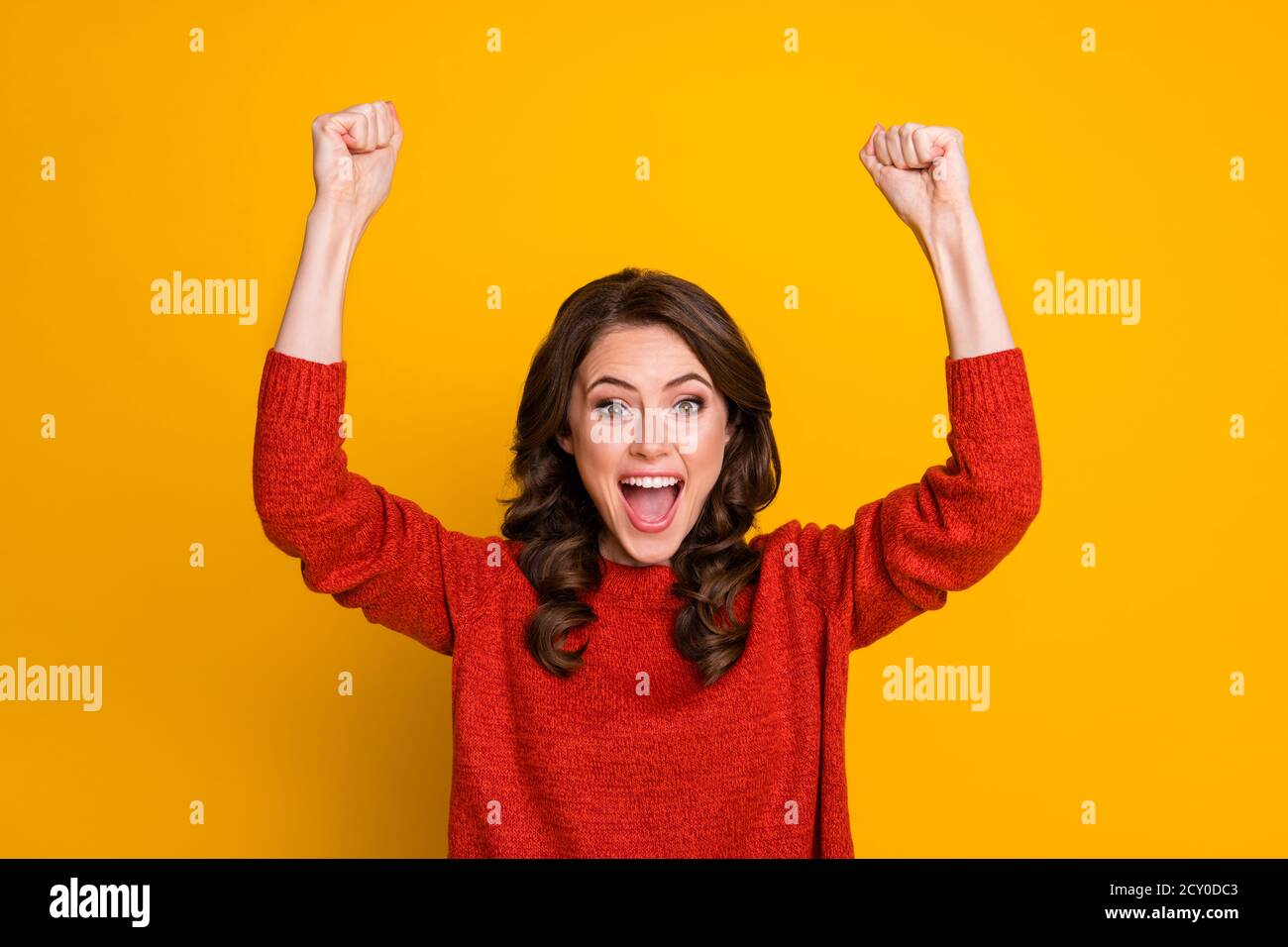Photo of pretty girl raising up hands screaming yeah isolated over ...