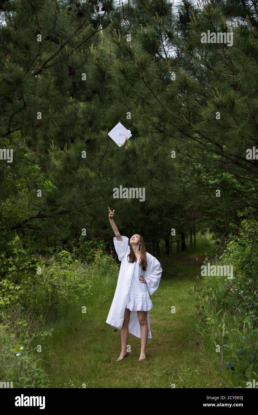 Teen girl wearing mortarboard hi-res stock photography and images - Alamy