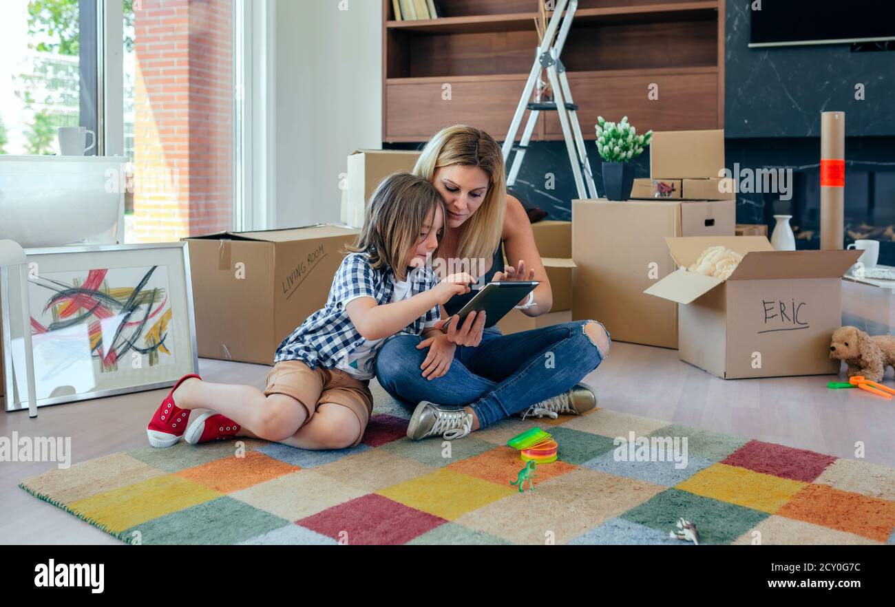 Mother son resting watching hi-res stock photography and images - Alamy