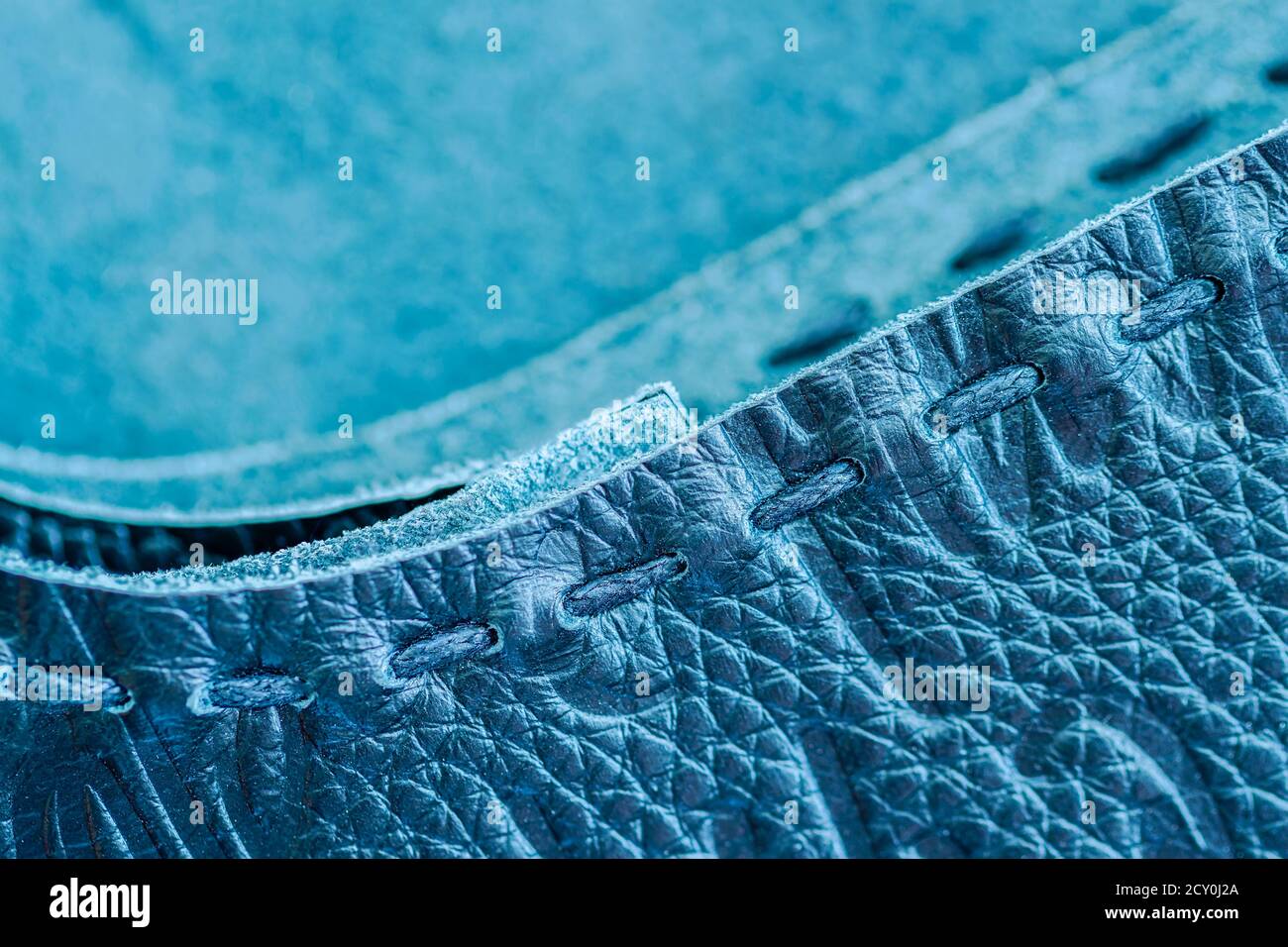 Texture of blue genuine leather sewn with hand made sewing stitch. For ...