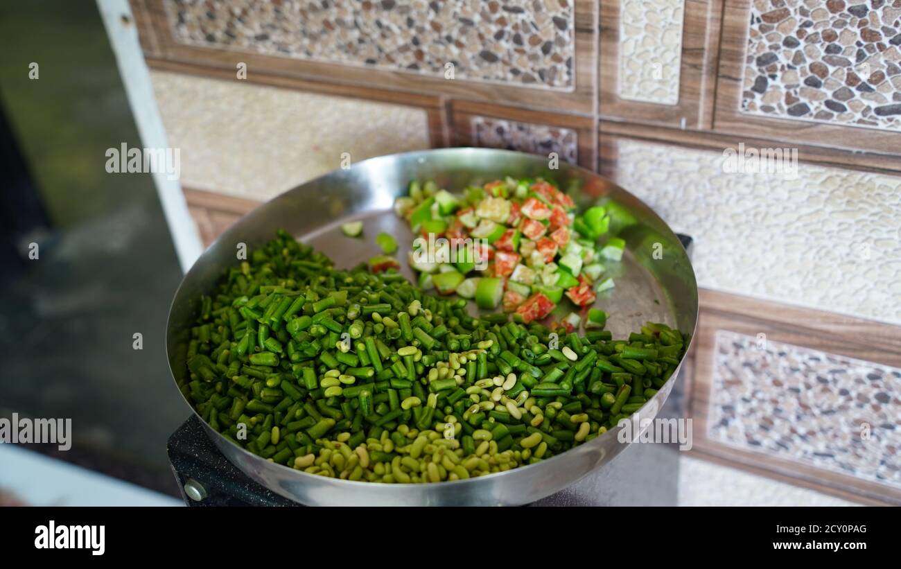 fresh chopped cut vegetables in the kitchen Stock Photo - Alamy