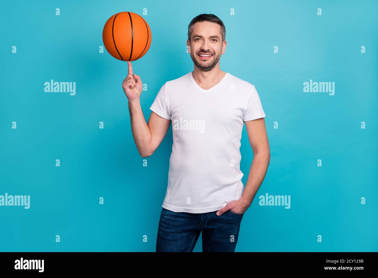 White handsome man spinning basket hi-res stock photography and images ...
