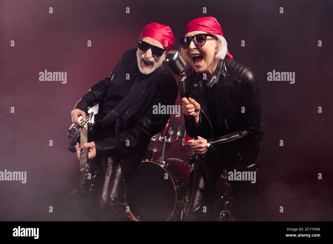Photo of retired lady man popular old rock group family play solo ...