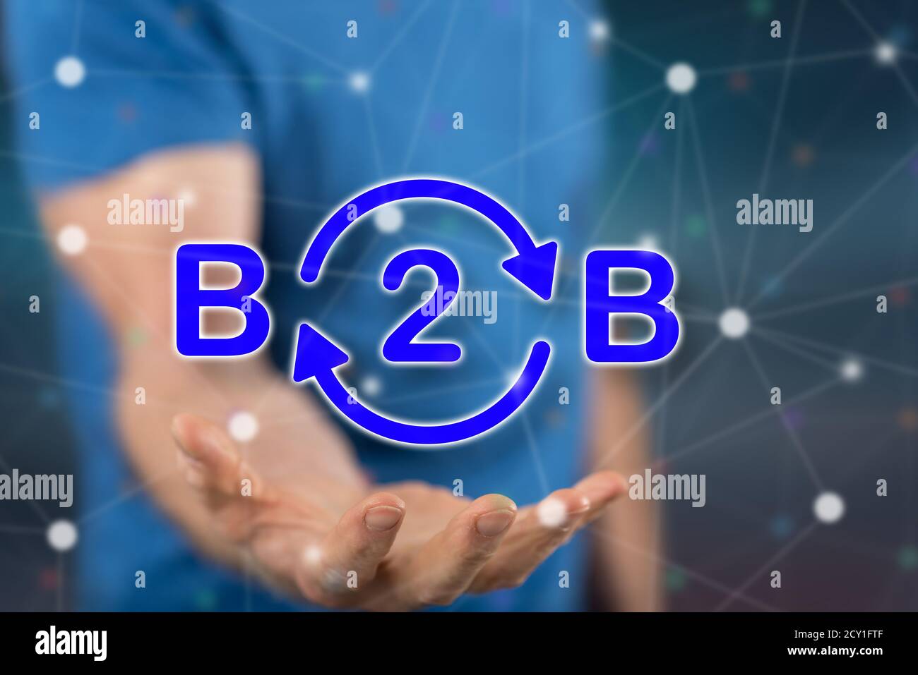 B2b concept above the hand of a man in background Stock Photo - Alamy