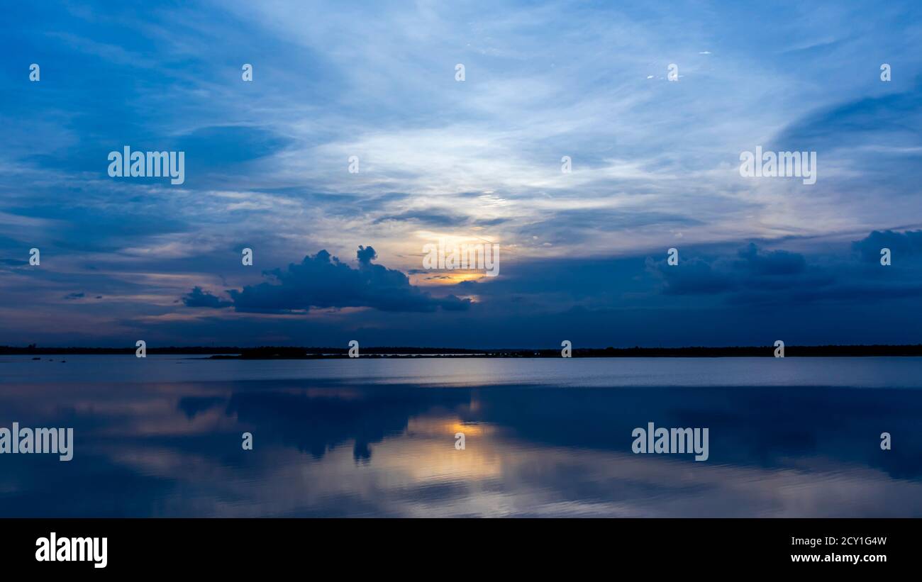 beautiful blue sunset or sunrise Stock Photo - Alamy