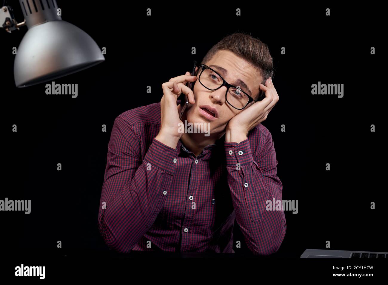 Male manager indoors dark background communication red shirt model ...