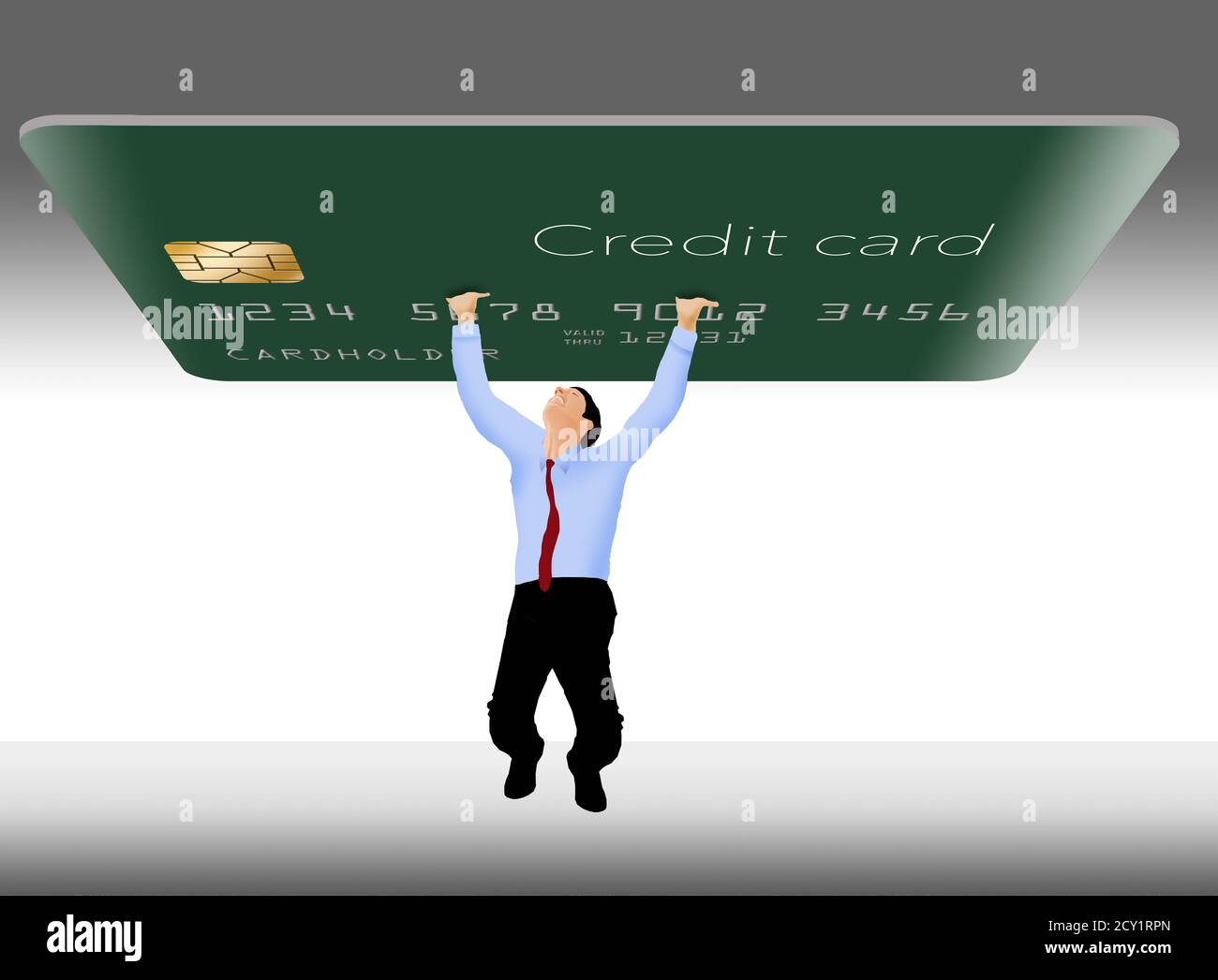 A man struggles to hold up a giant credit card that represent credit ...