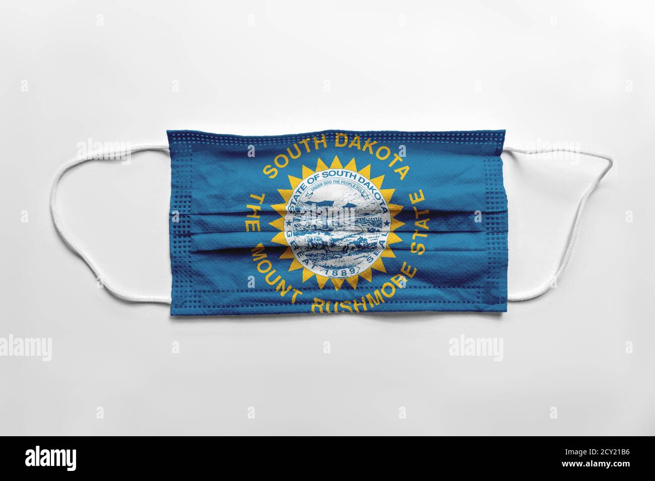 Face mask with South Dakota flag printed, on white background, isolated ...