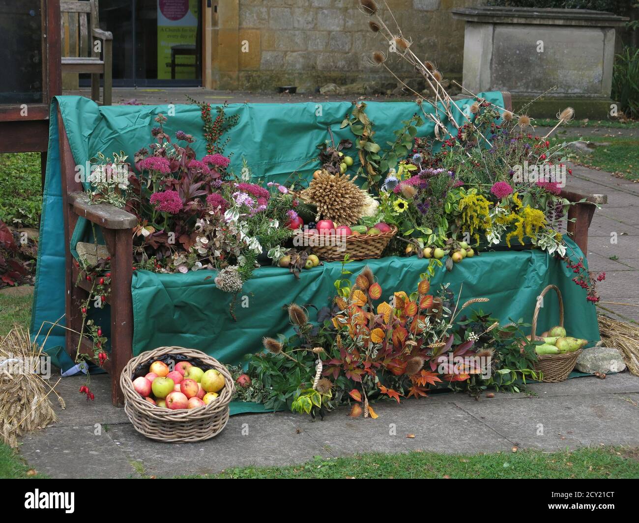 Floral display of fruit, vegetables and flora in an attractive harvest ...