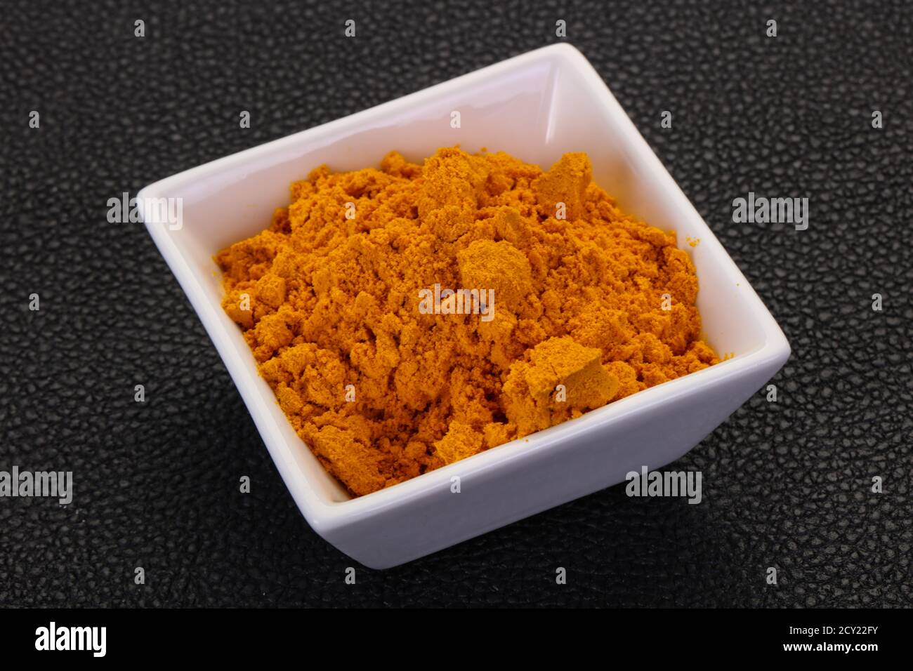Aroma turmeric powder in the bowl Stock Photo - Alamy
