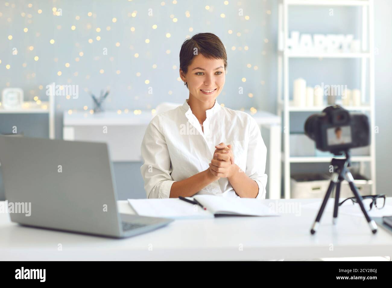 Female presenter desk hi-res stock photography and images - Alamy