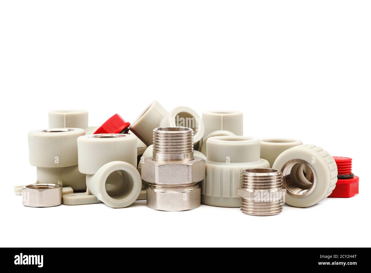Set of metal-plastic plumbing couplings, adapters, plugs isolated on ...