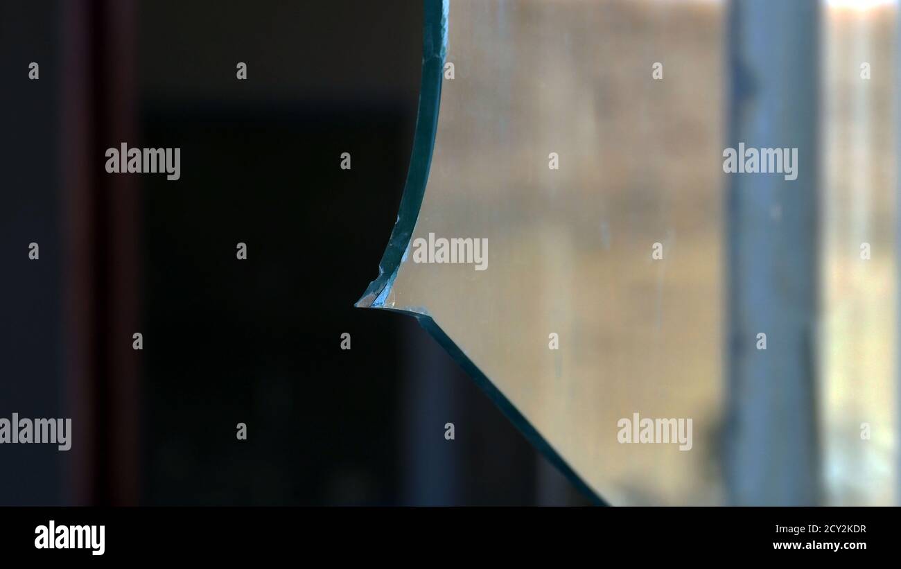 roken window glass, sharp piece of glass like a sharp knife Stock Photo ...