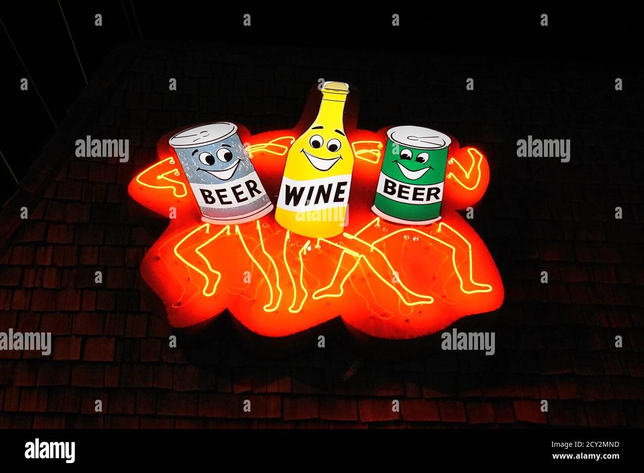 Beer wine beer dancing neon sign on roof Stock Photo - Alamy
