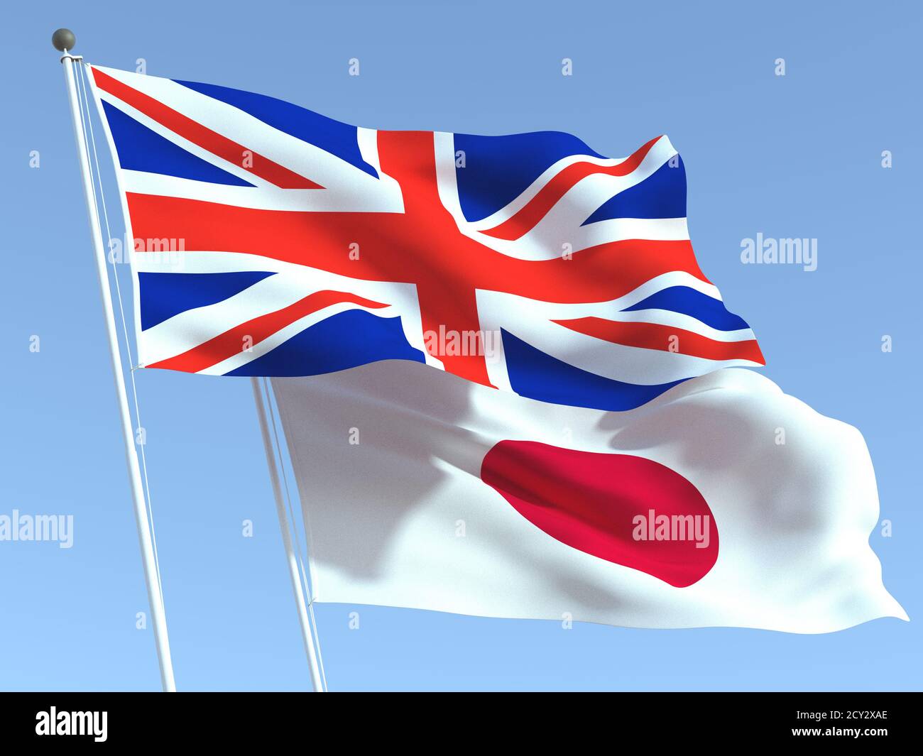 Two waving state flags of United Kingdom and Japan on the blue sky ...