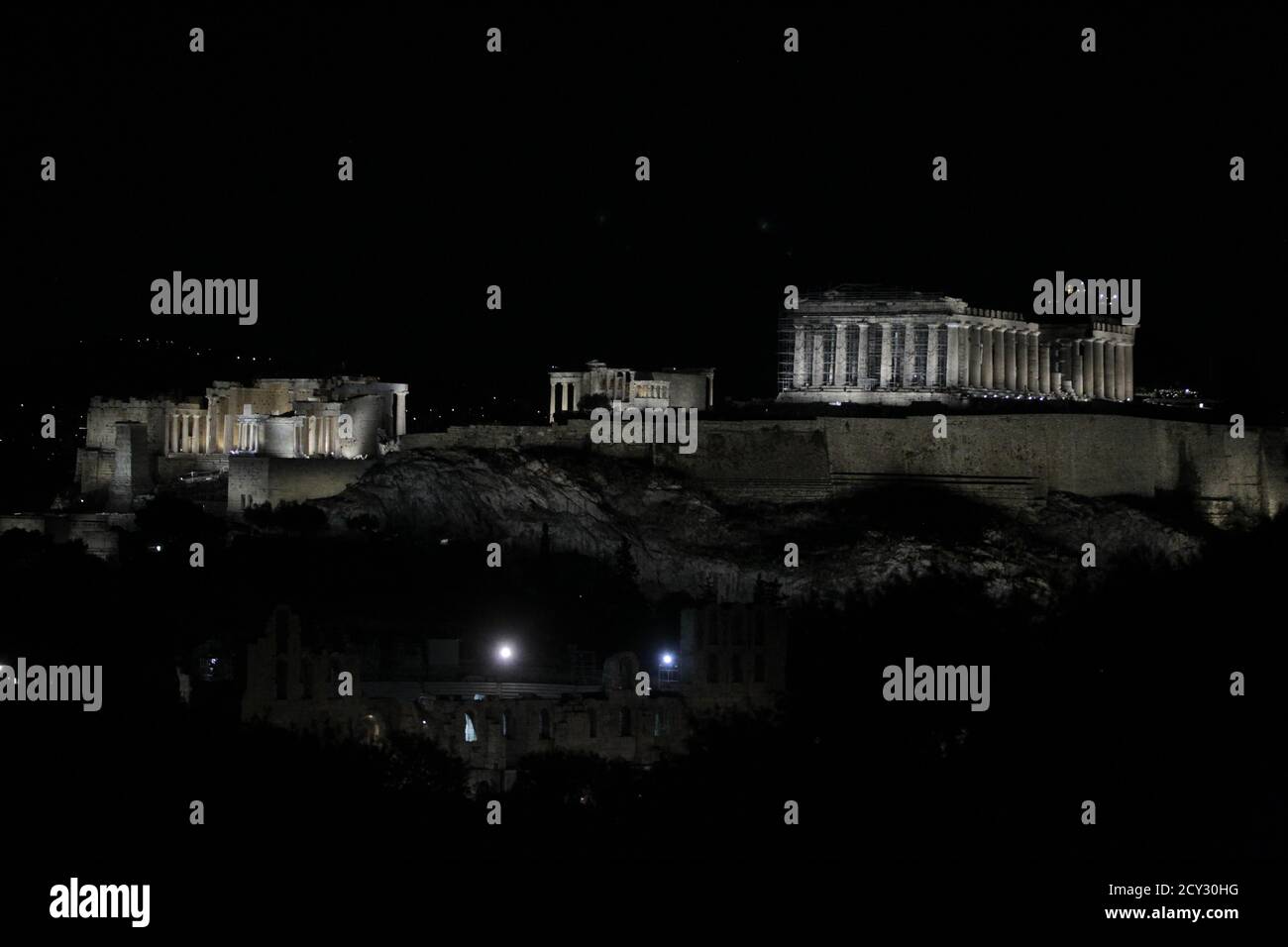 A new lighting system illuminates the Parthenon temple atop of the ...
