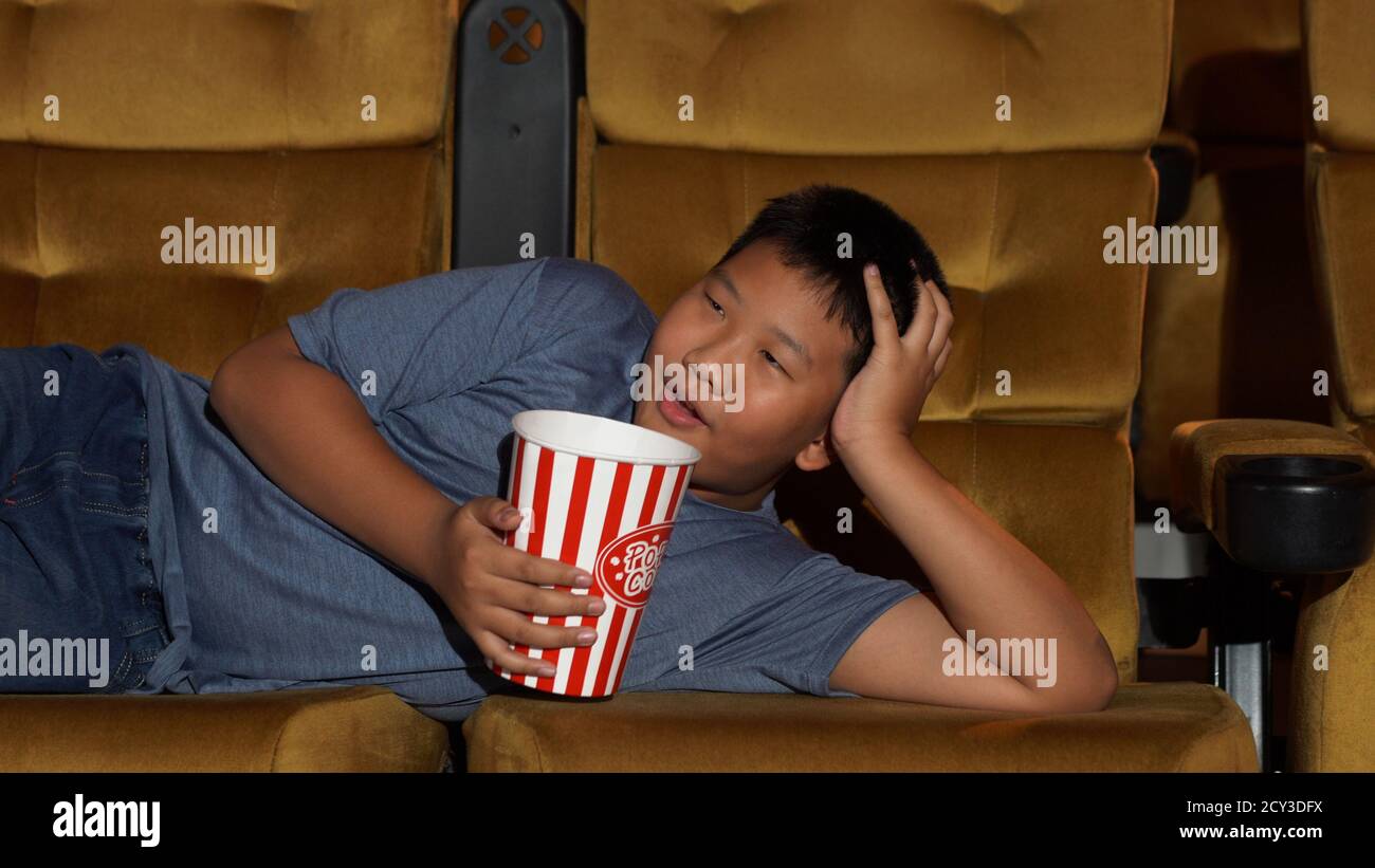 Children row movie popcorn hi-res stock photography and images - Alamy