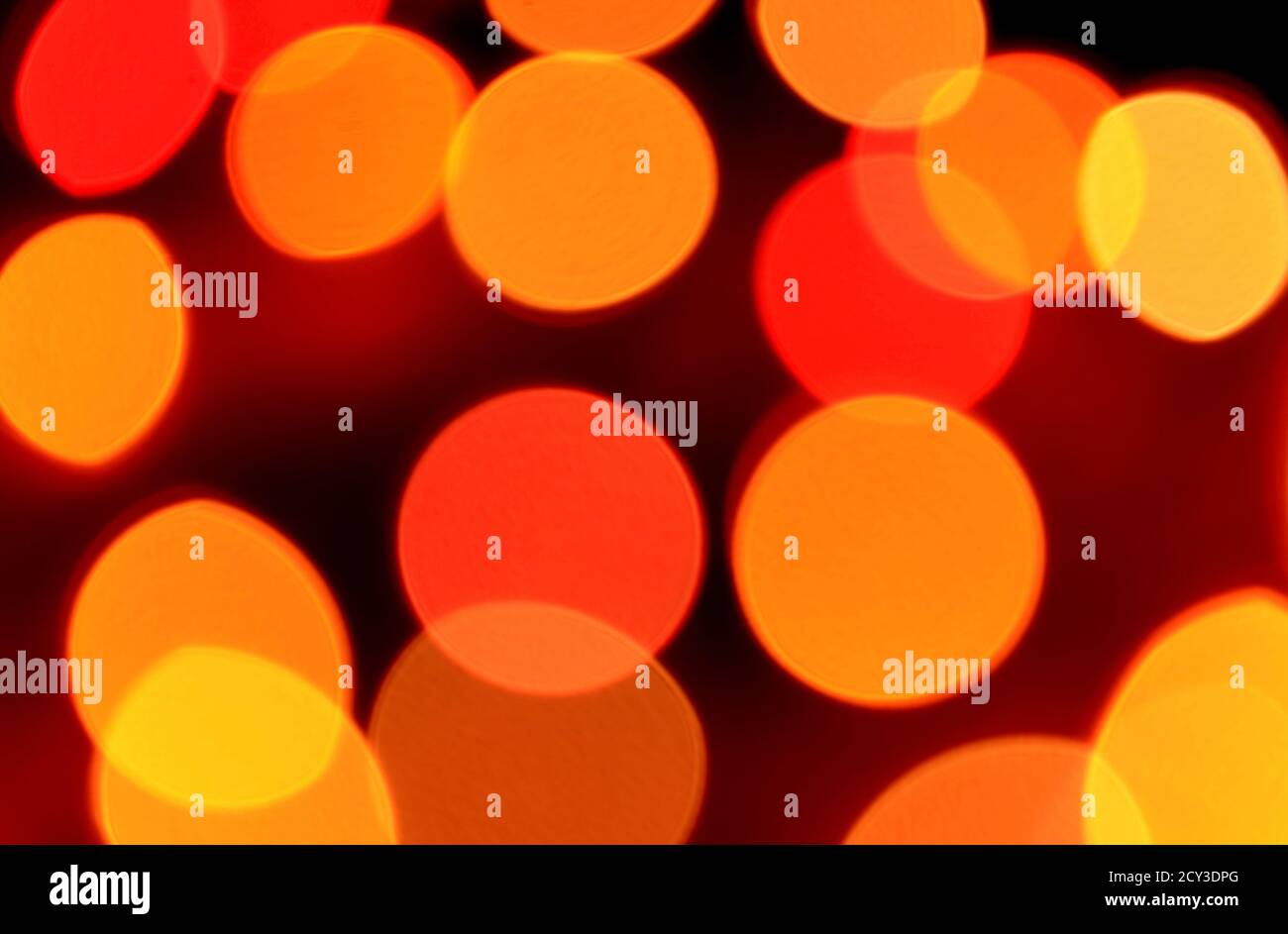 Abstract Blurred Orange Color Illuminated Light Splashing on Black ...