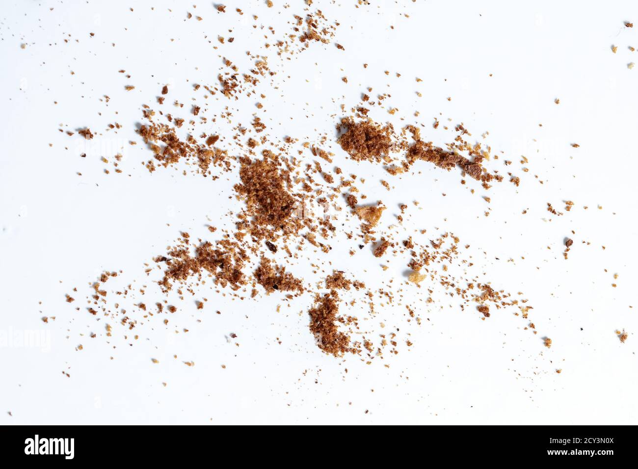 crumbs of cookie macro isolated on white background Stock Photo - Alamy