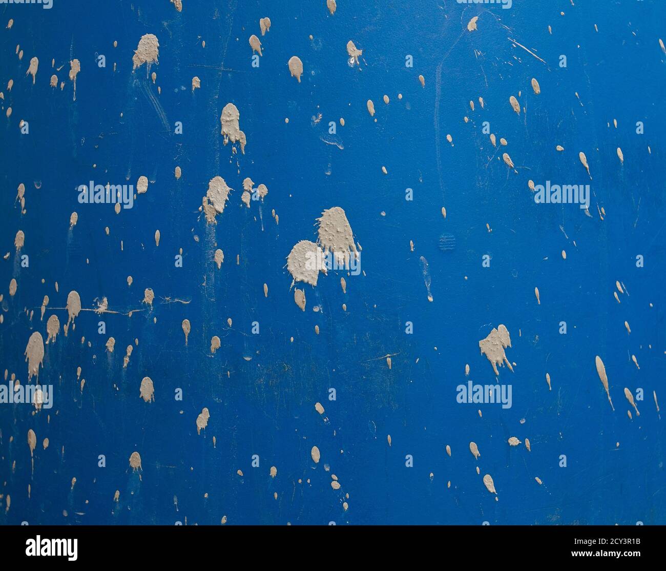 splash of cement for concrete on blue background Stock Photo - Alamy