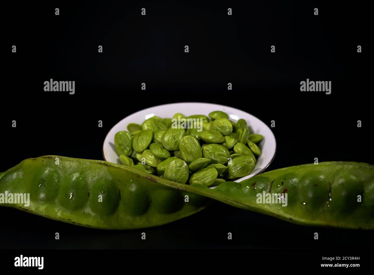 Twisted cluster bean, Parkia speciosa bean, bitter bean Stock Photo - Alamy