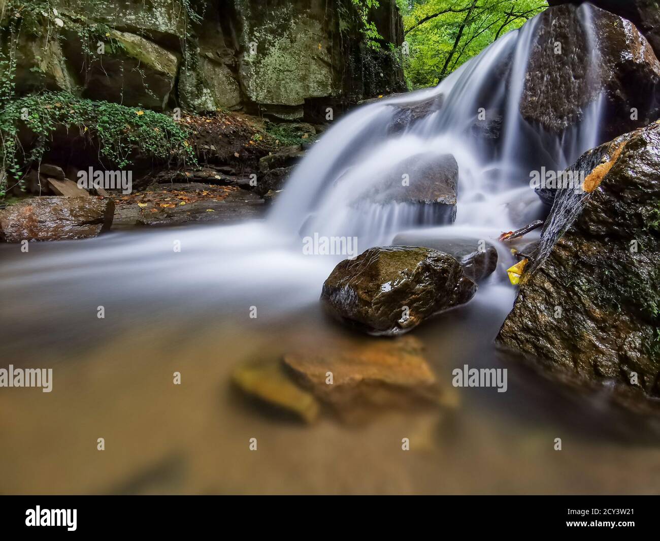 Silky waterfall in the forest, natural beauty Stock Photo - Alamy