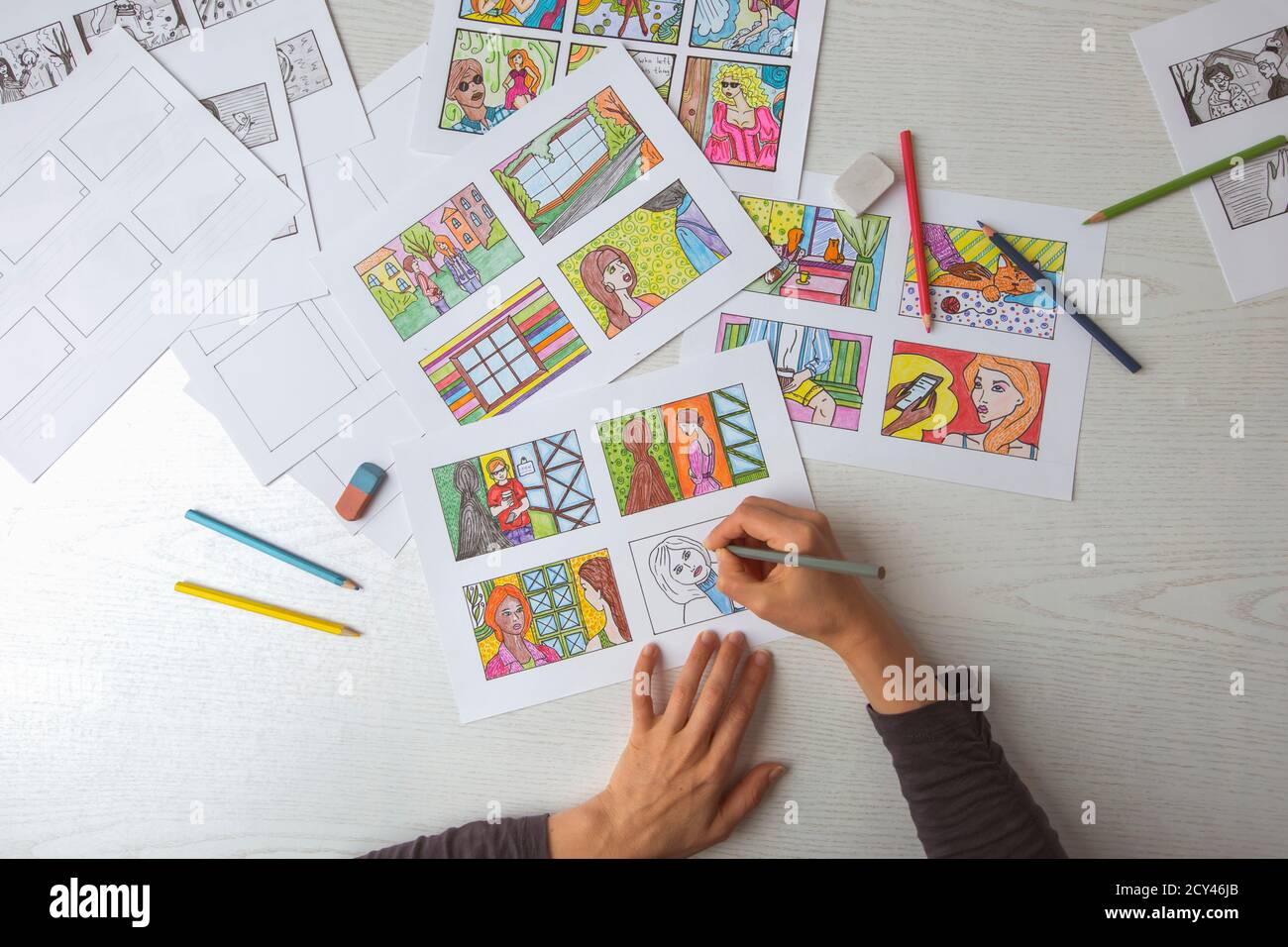 An animator painter draws a color storyboard for a comic book or movie ...