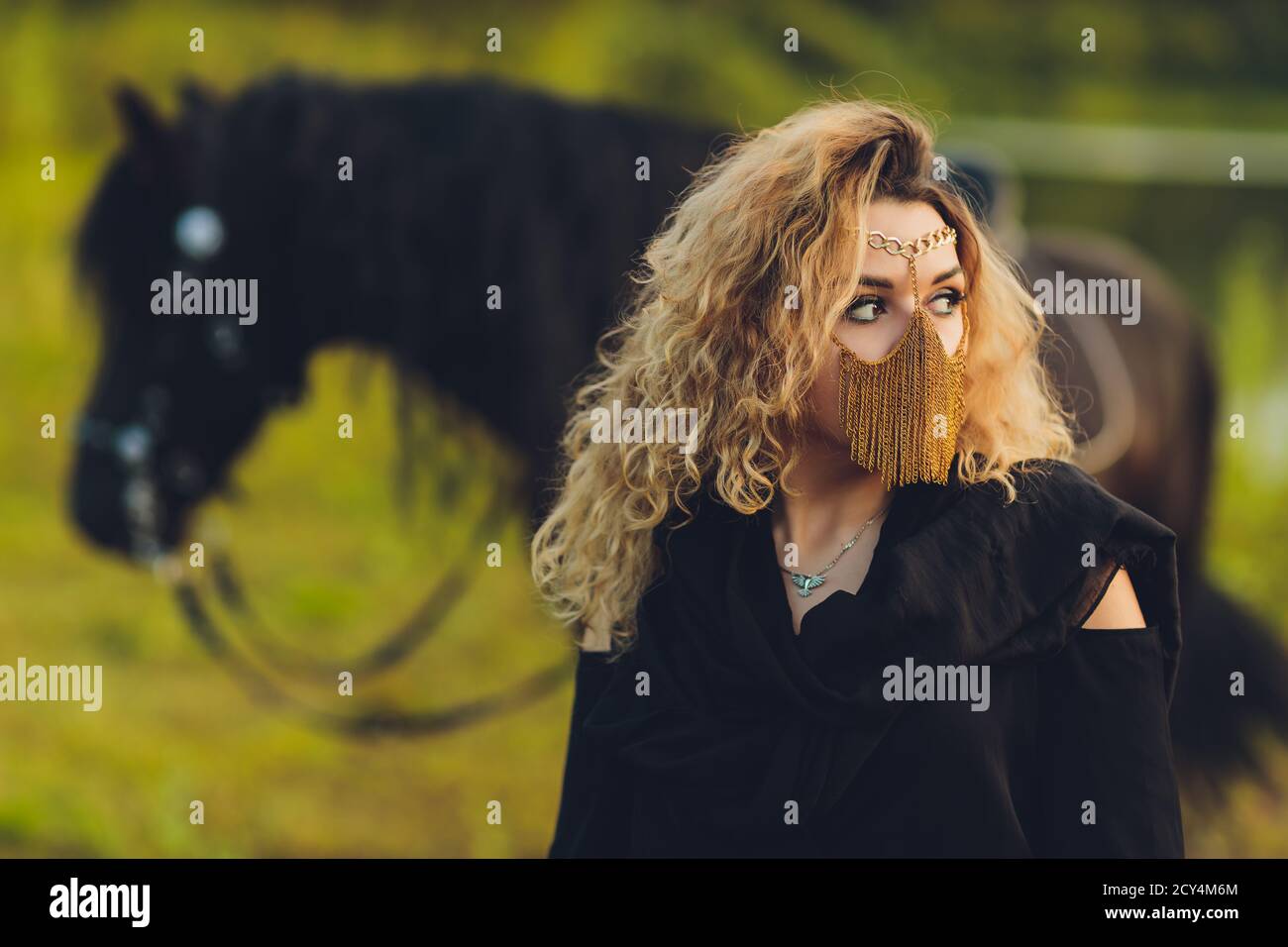 Muslim woman in hijab riding a horse Stock Photo - Alamy