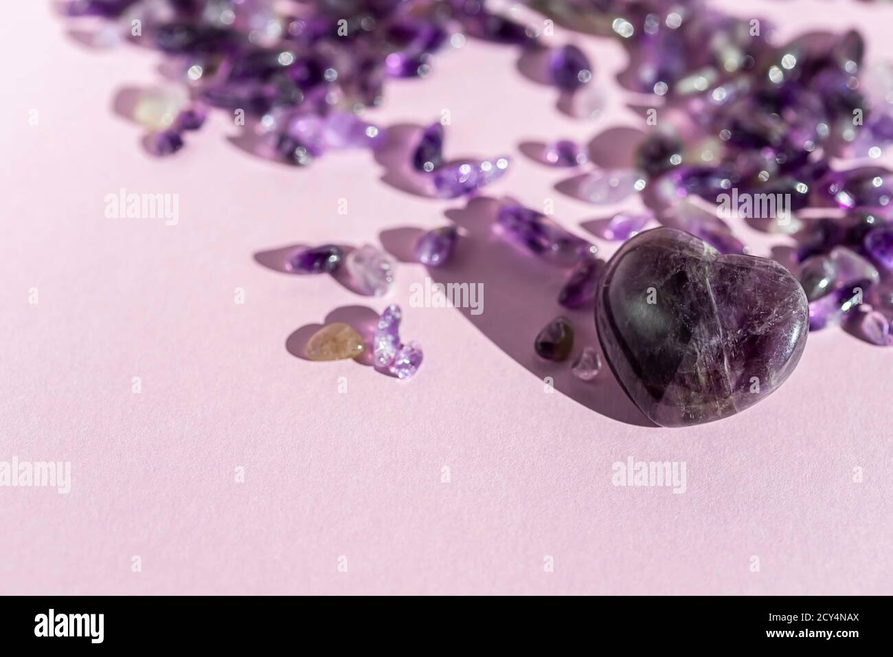 Crystal minerals for meditation on pink background. Magic Rock for ...