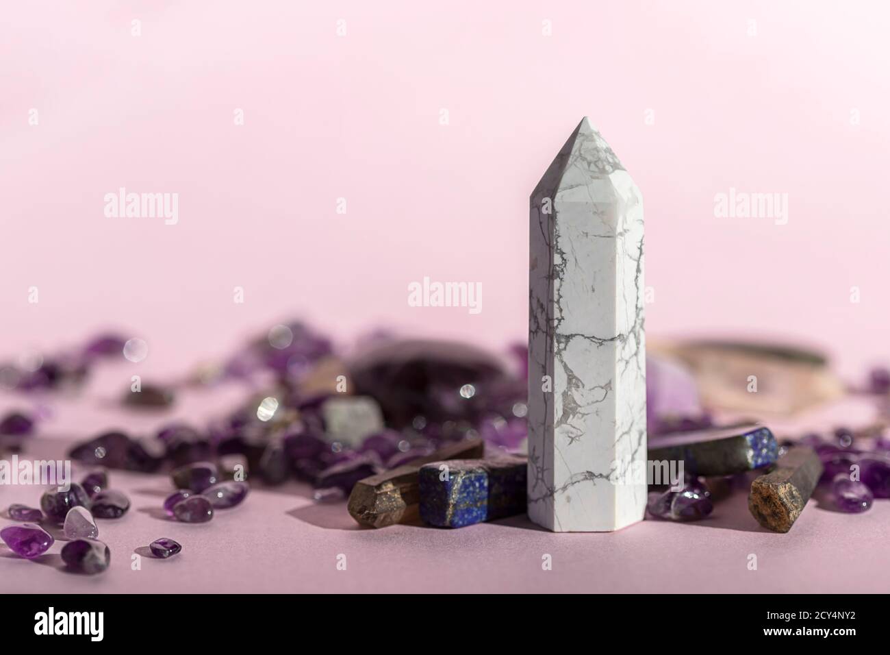 Crystal minerals for meditation on pink background. Magic Rock for ...