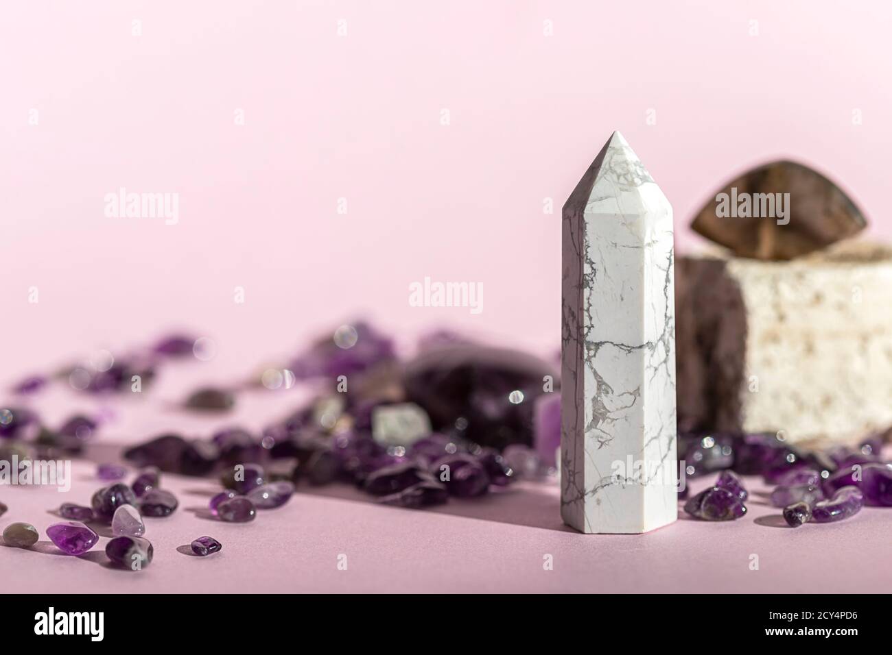 Crystal minerals for meditation on pink background. Magic Rock for ...