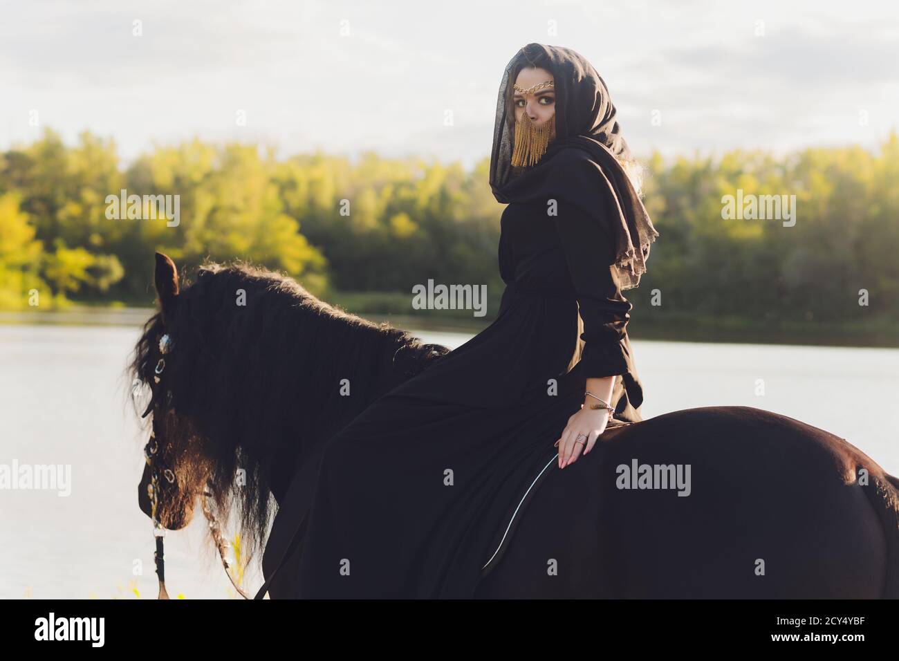 Muslim woman hijab horse hi-res stock photography and images - Alamy