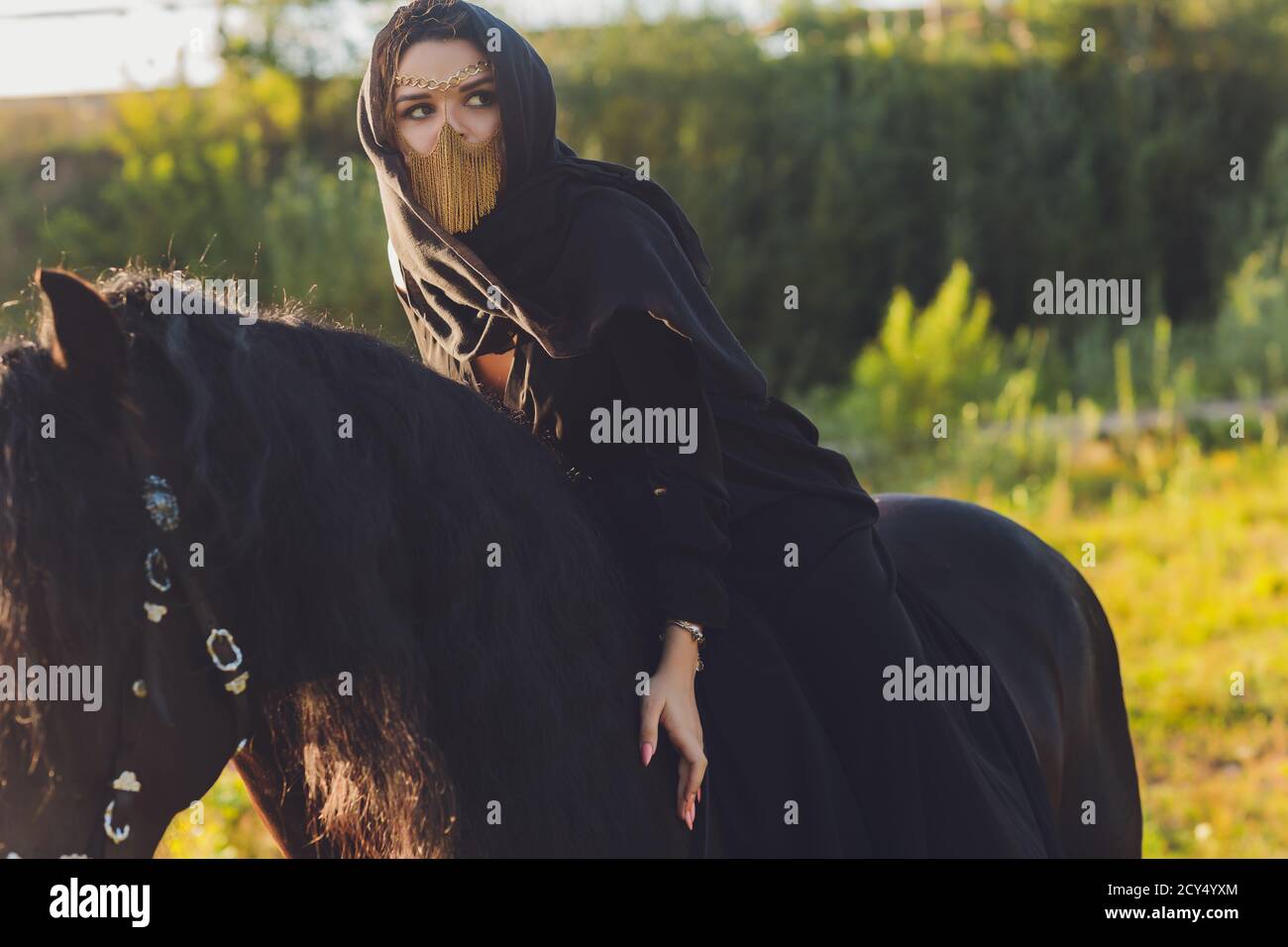Muslim woman hijab horse hi-res stock photography and images - Alamy