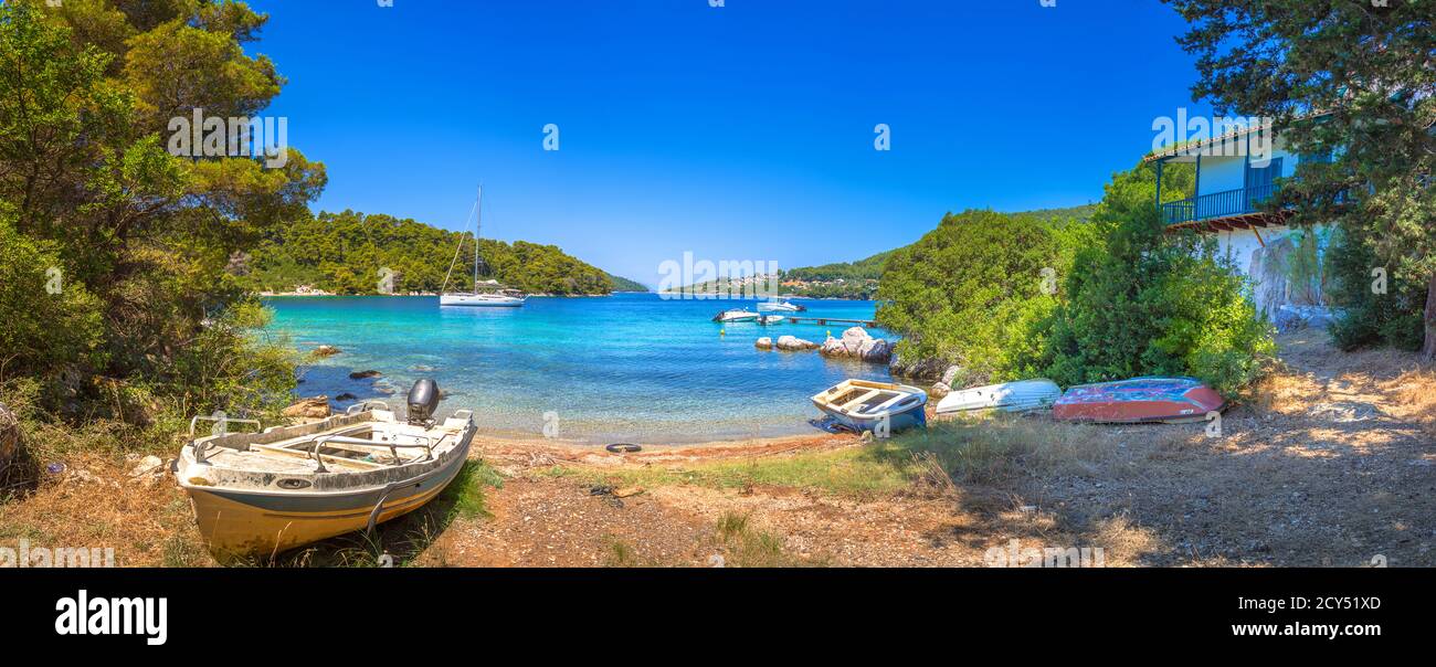 Gialia beach with old windmill in Alonnisos island, Greece Stock Photo ...