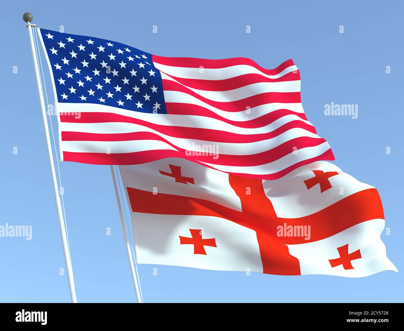 Two waving state flags of United States and Georgia on the blue sky ...