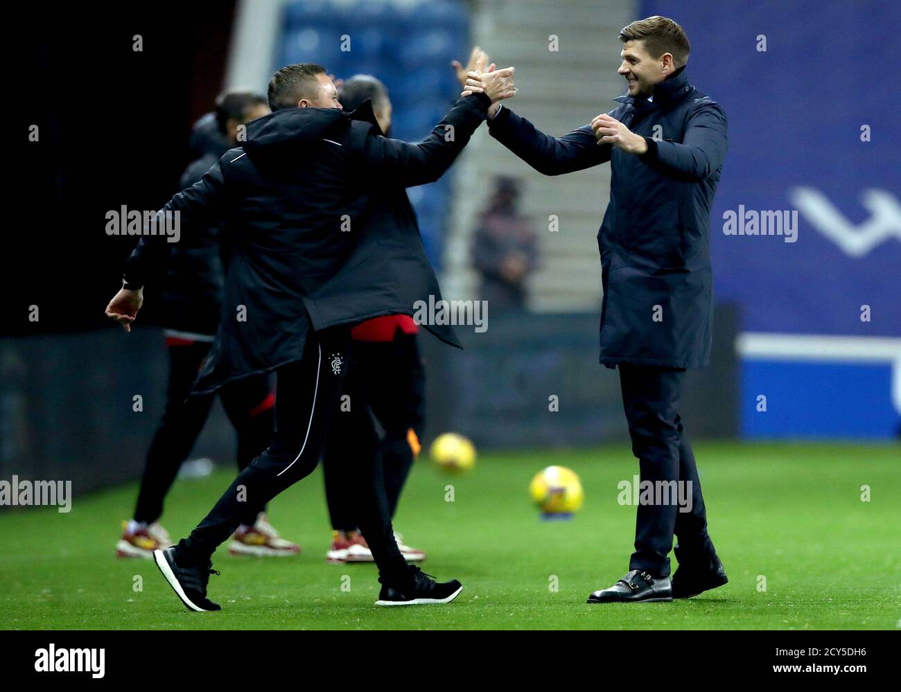 Rangers manager Steven Gerrard (right) celebrates with coach Tom ...