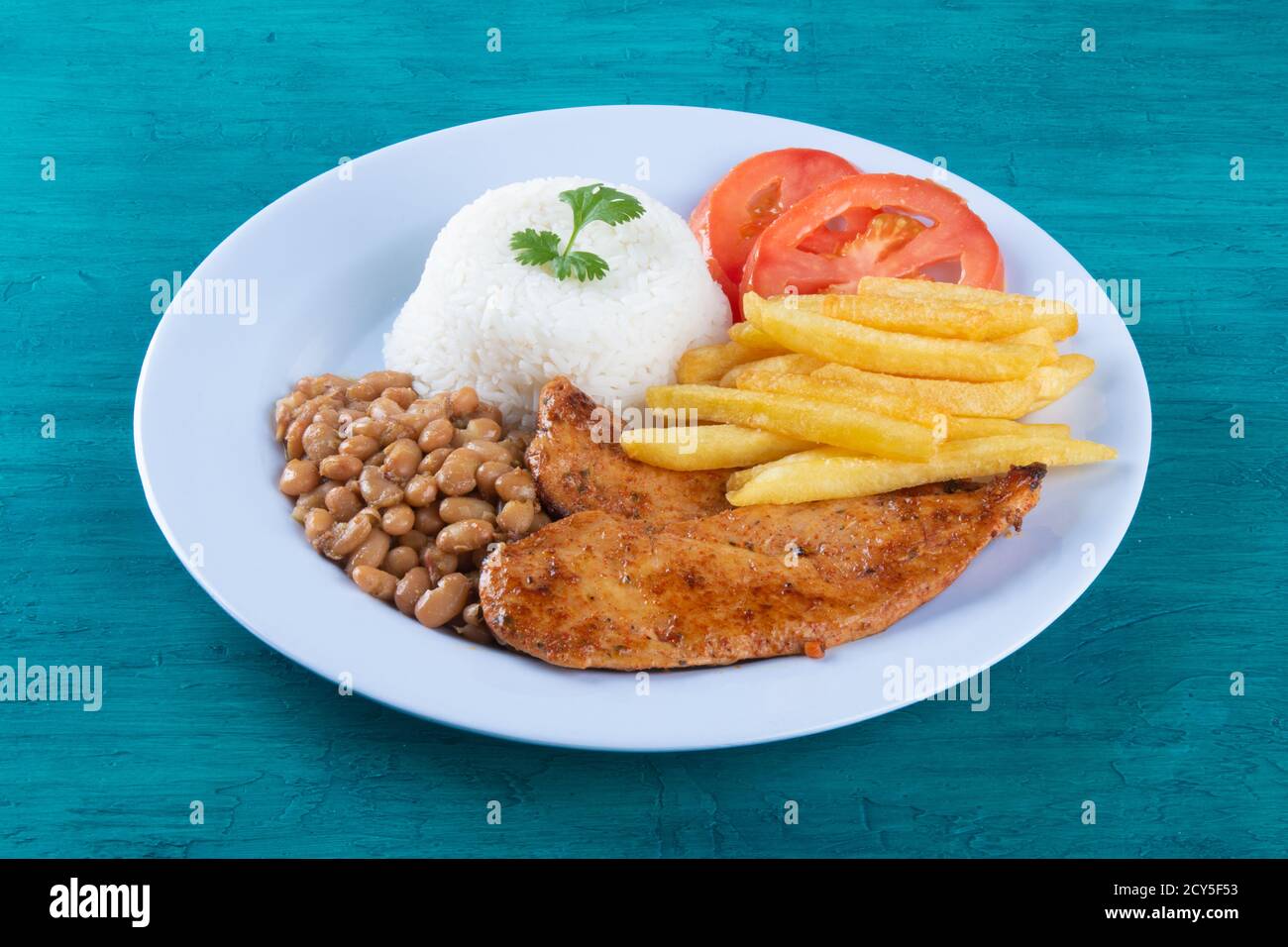 Traditional Brazilian food dish. Blue background. Copy space Stock ...