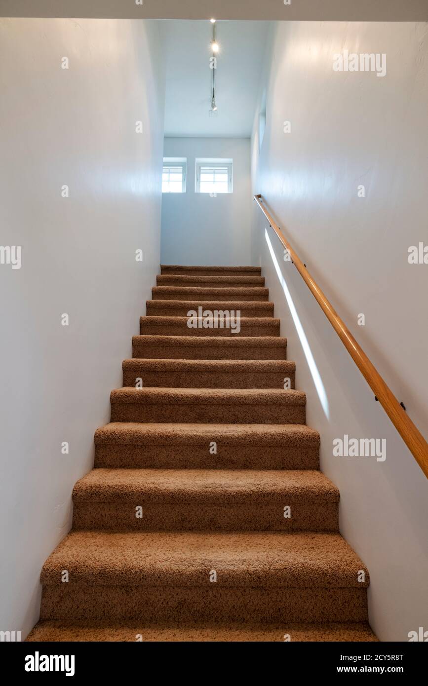 Empty residential stair well Stock Photo - Alamy