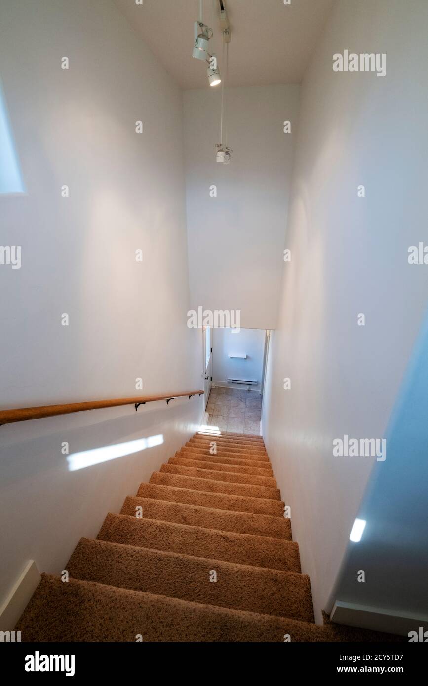 Empty residential stair well Stock Photo - Alamy