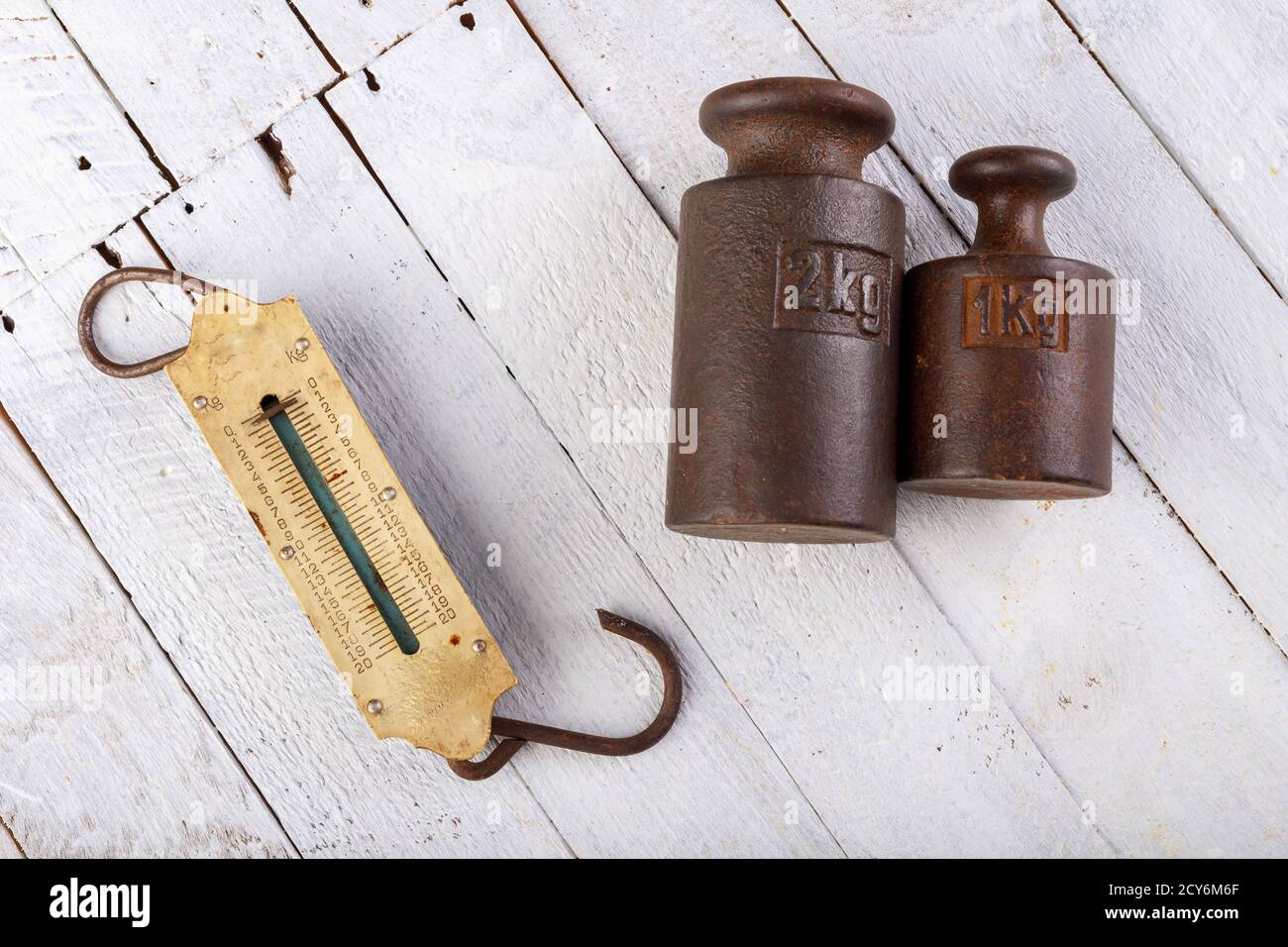 Manual scale and metal weight. Old scale for quick weighing in the ...