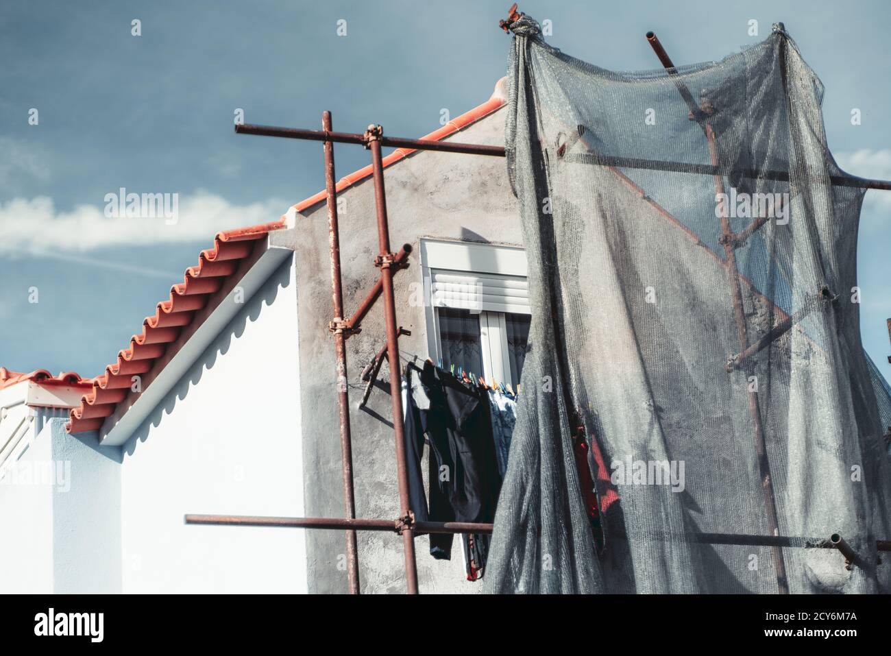 Under construction building covered fabric hi-res stock photography and ...