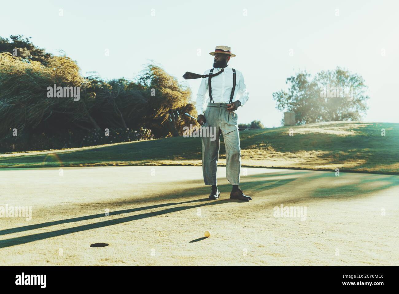 Golfer with cigar hi-res stock photography and images - Alamy