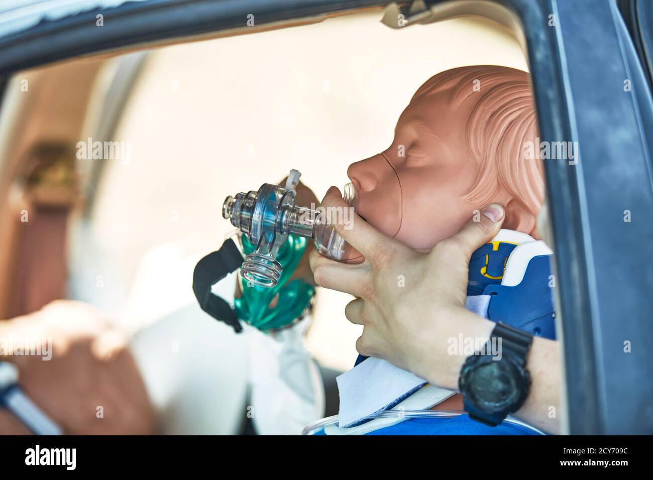 Paramedic Training class practicing on dummies in crashed car Stock ...