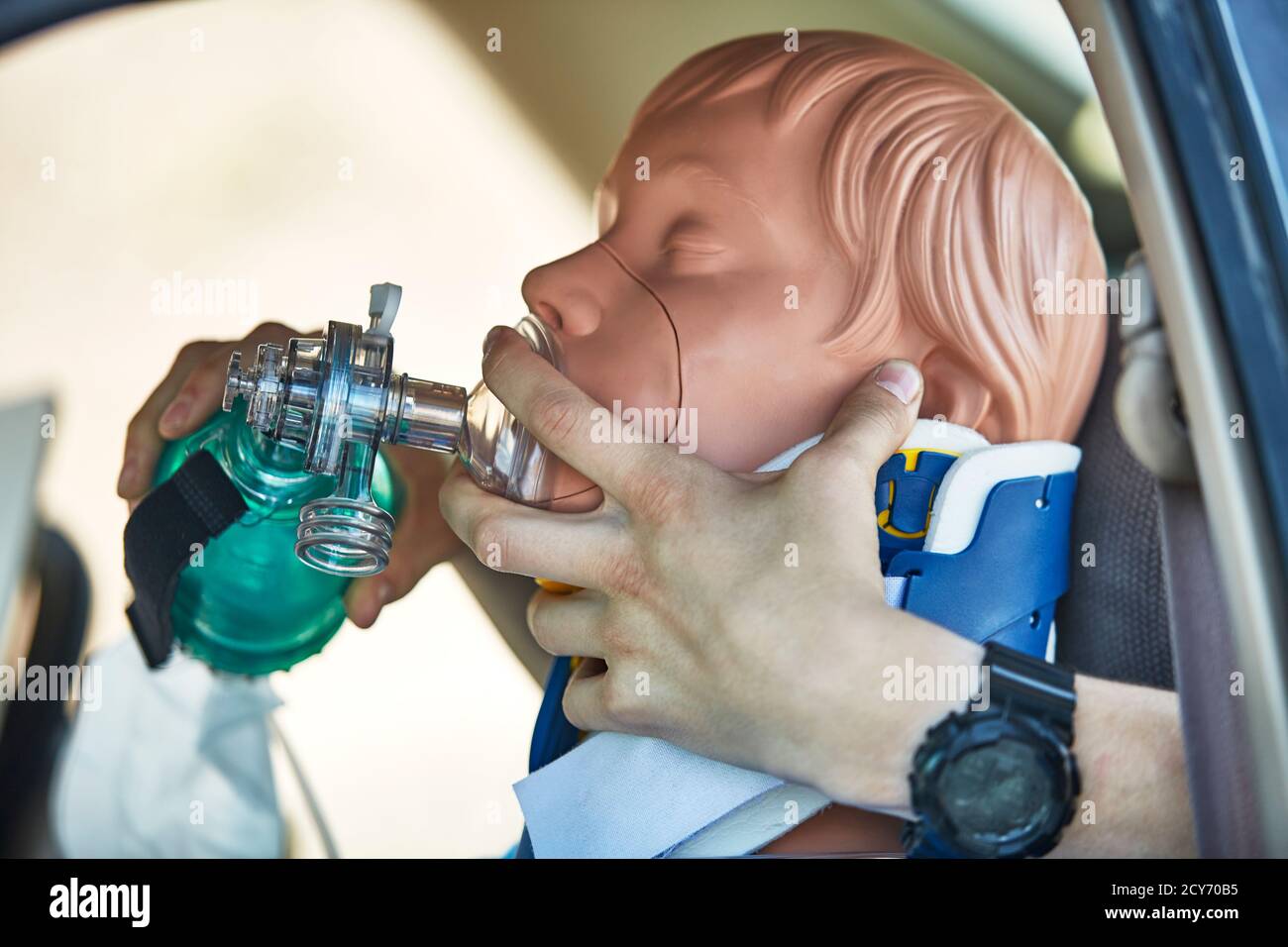 Paramedic Training class practicing on dummies in crashed car Stock ...