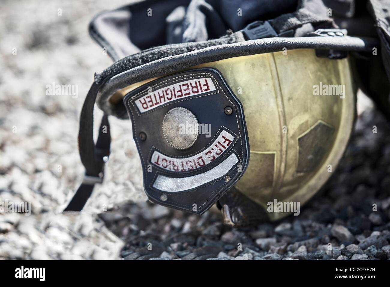 Firefighter helmet and jacket on the ground after practicing rescue ...